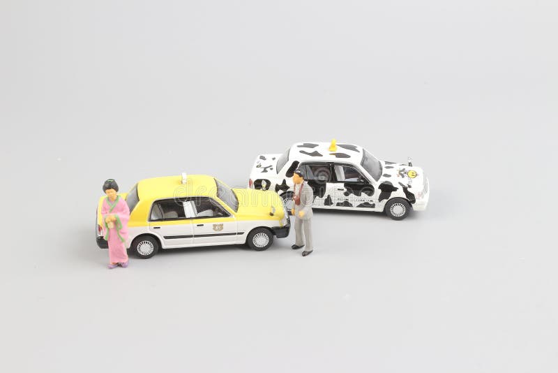 A Tiny of Toy Taxi with the Traveler Figure Stock Image - Image of ...