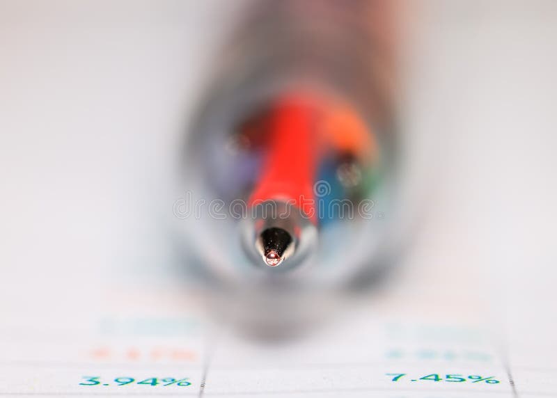 Tip of Ball Point Pen on Balance Sheet Stock Image - Image of business ...