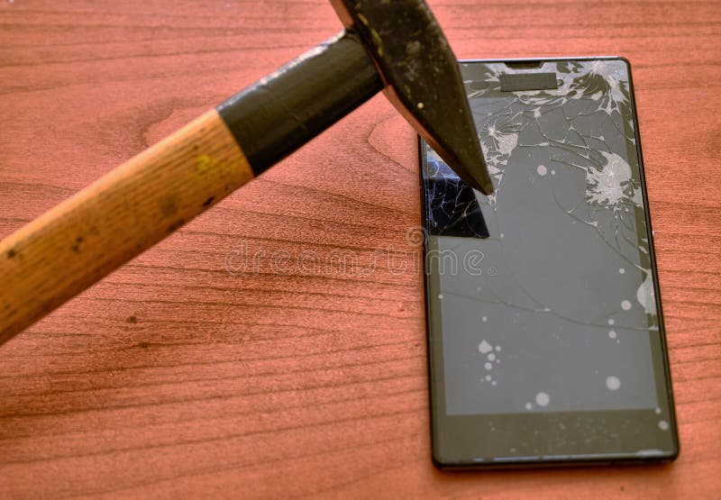 The Tip of the Hammer Hit the Screen of the Smartphone Stock Image ...