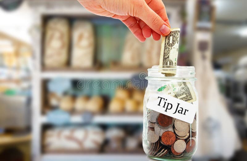 Tip Jar Money in a Restaurant Stock Image - Image of tipping ...