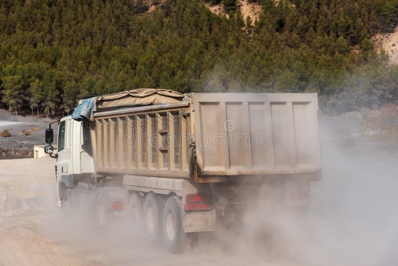 Tipper Truck Driving through a Quarry Stock Photo - Image of gravel ...