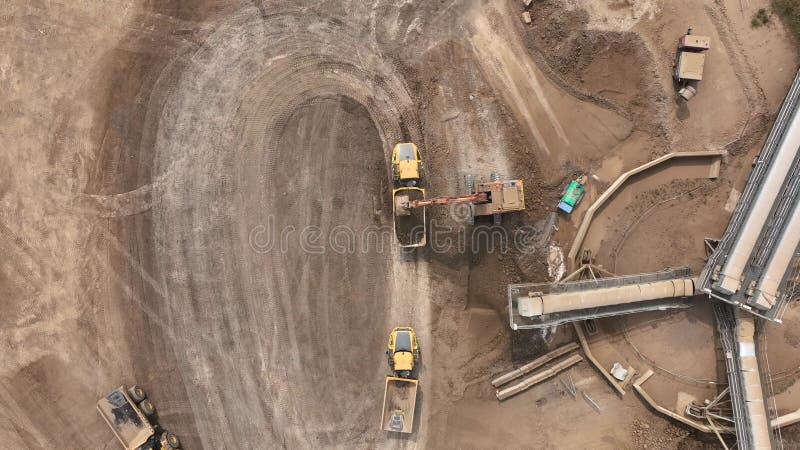 Tipper Trucks Being Loaded Up with Earth by a Digger Stock Footage ...