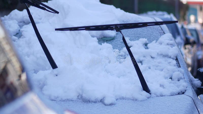Tips for Clearing Snow from Car Windshields during Winter Storms Stock Footage - Video of ...