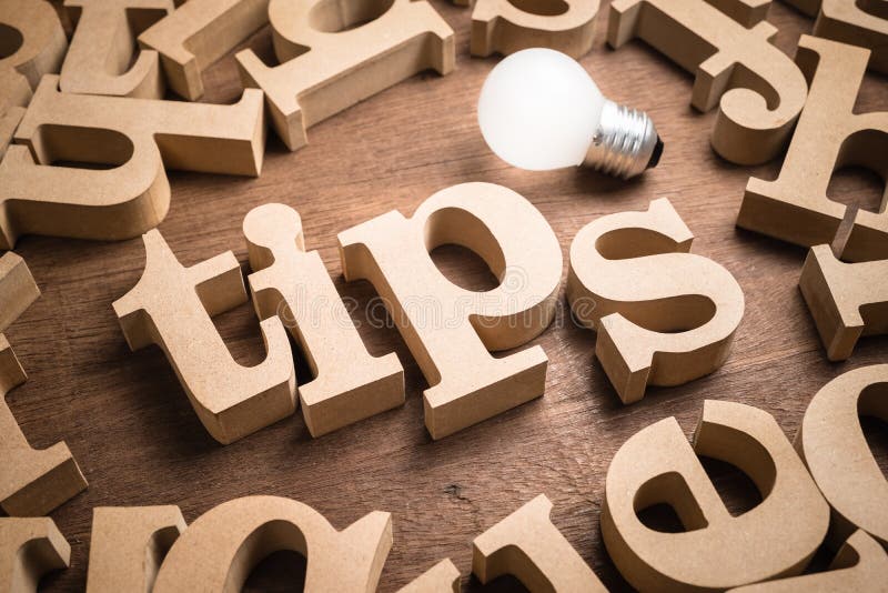Tips Idea stock photo. Image of guide, lightbulb, scattered - 145334474