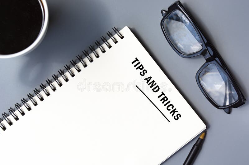 Tips and Tricks Text Written on Notepad with Pen, Coffee and Reading ...