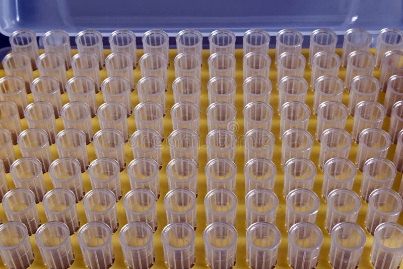 Tips in Yellow Plastic Rack for Micropipette Stock Photo - Image of ...