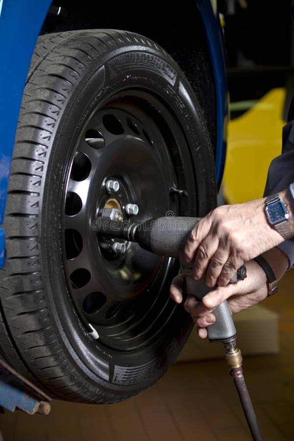 Tire change stock photo. Image of automobile, repair - 27986944