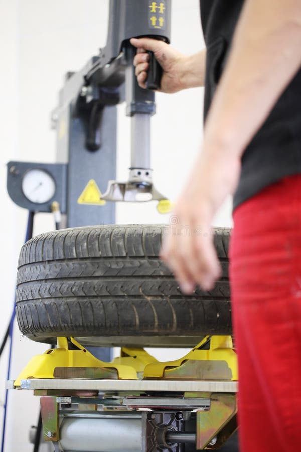 Changing a tire stock image. Image of instrument, collar - 9108145