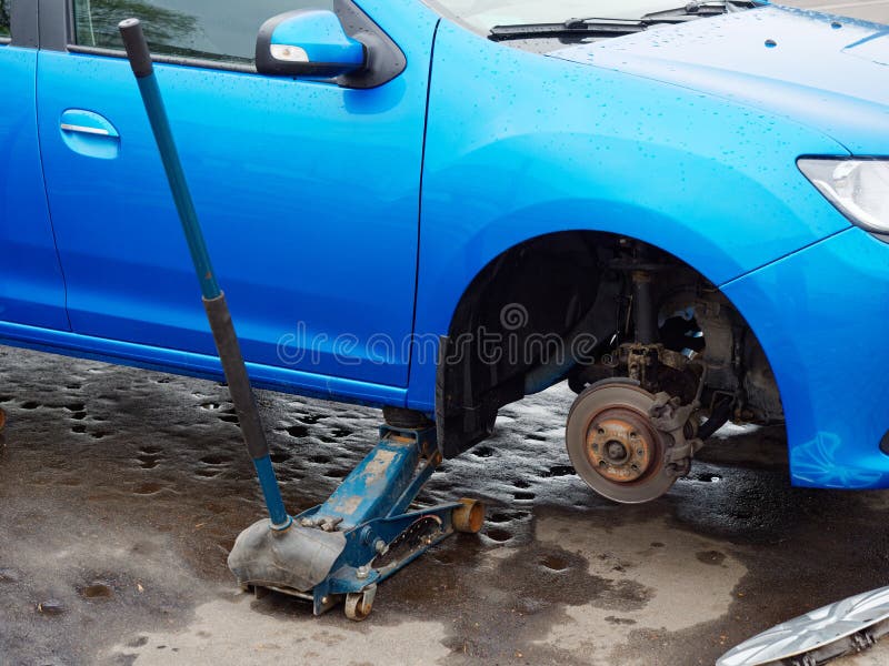 Tire Fitting. Replacement of Seasonal Rubber with a Car Stock Image ...