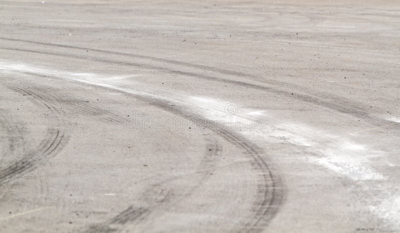 Tire marks on road track stock image. Image of motion - 40659205