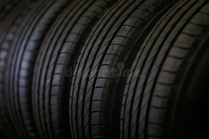 Tire Stack Background and Selective Focus. Car Tires at Warehouse Stock ...
