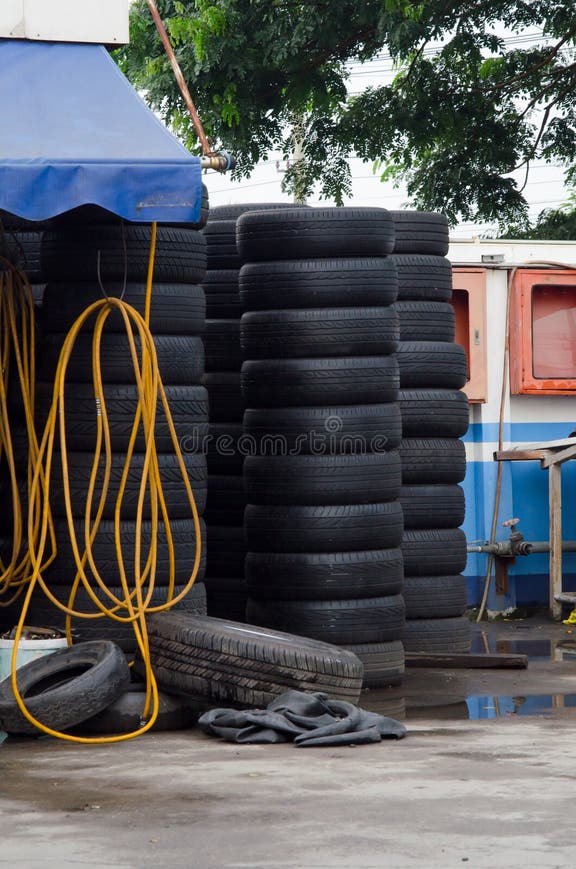 Tire Stack Roll in Vertical Stock Image - Image of black, detail: 33815615