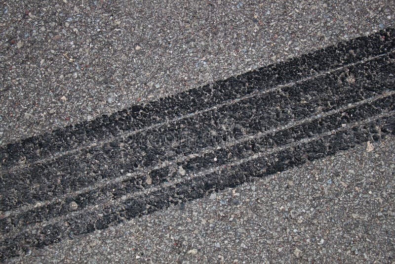 Tire track on asphalt stock image. Image of material - 19759773