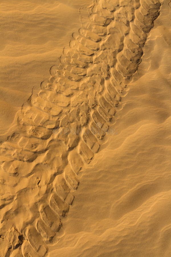 Tire track on the desert stock photo. Image of close - 151871938
