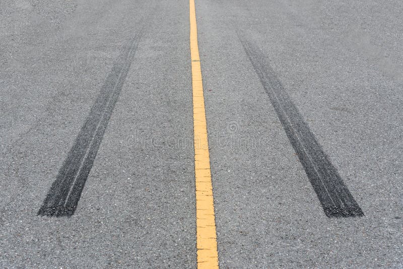 Tire Tracks , Wheel Trace on Asphalt Road Stock Photo - Image of ...