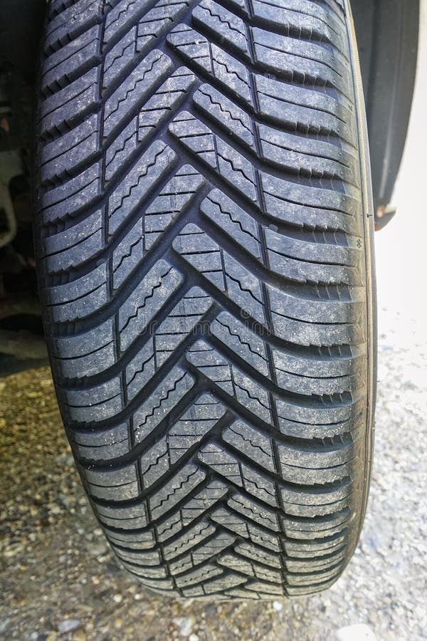 A Tire with a Tread Pattern Stock Photo - Image of surface, object ...