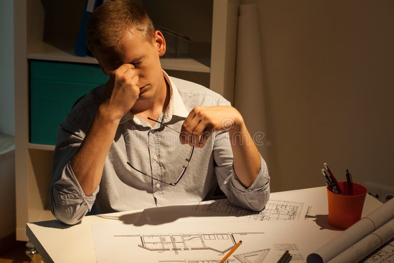 Tired architect at night stock image. Image of night - 43545391