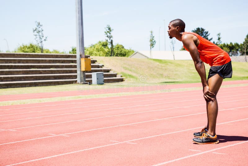 Tired Athlete Standing on Running Track Stock Photo - Image of ...