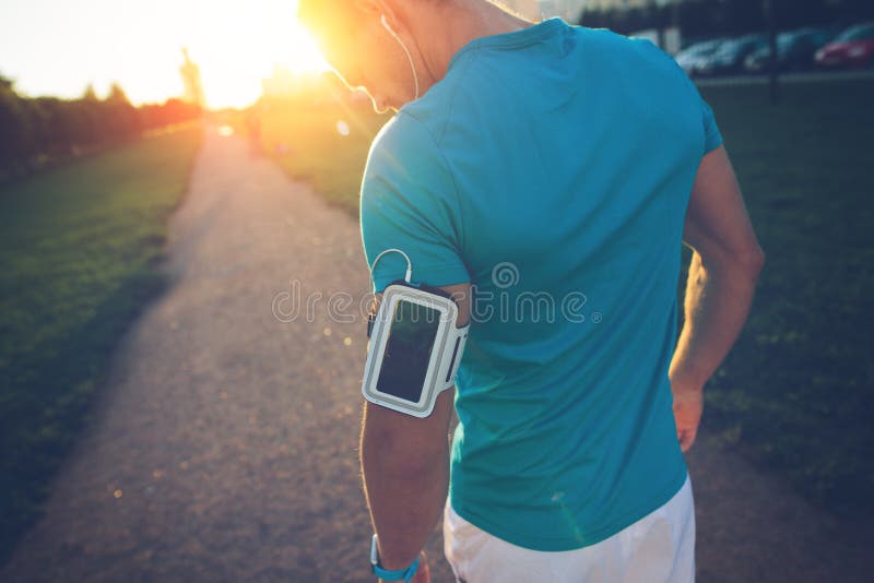 Tired Athlete Walking in the Park after Workout Stock Image - Image of ...