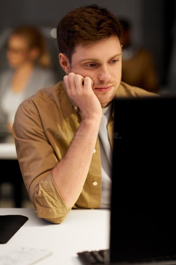 Tired or Bored Man on Table at Night Office Stock Photo - Image of ...