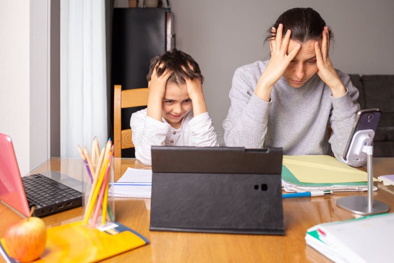 Boy Doing His Homework while Lock Down, Studying Remotely Stock Photo ...
