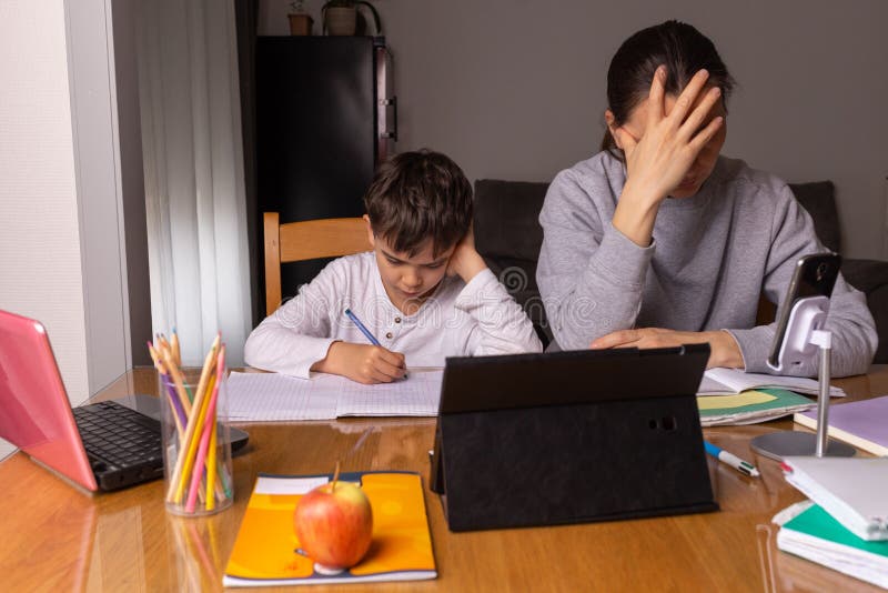 Boy Doing His Homework while Lock Down, Studying Remotely Stock Photo ...