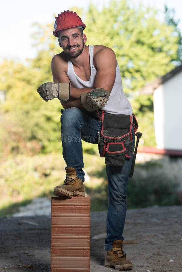 Tired Builder Resting on Brick Stock Image - Image of relaxation ...