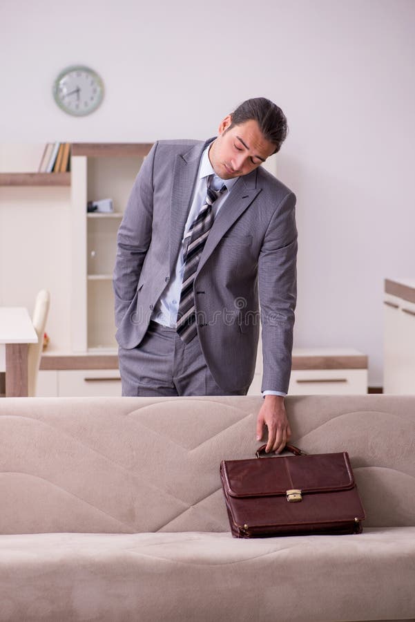Tired Young Businessman Coming Home after Working Day Stock Image ...