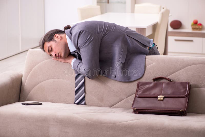 Tired Young Businessman Coming Home after Working Day Stock Photo ...