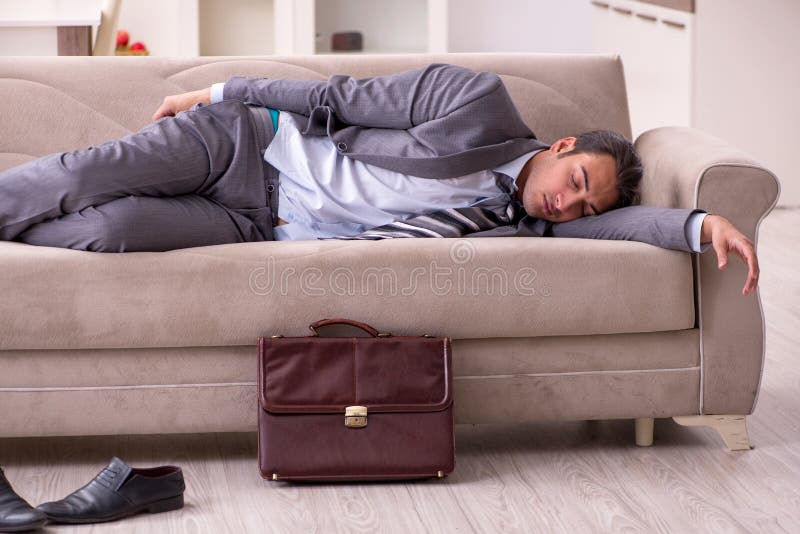 Tired Young Businessman Coming Home after Working Day Stock Photo ...