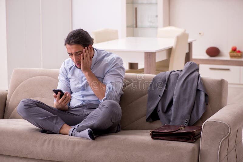 Tired Young Businessman Coming Home after Working Day Stock Image ...