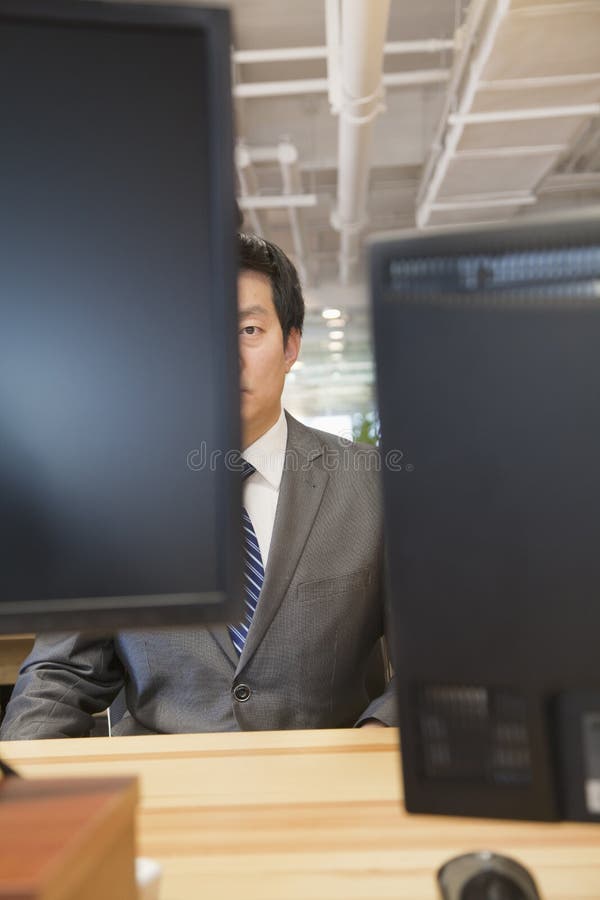 Tired Businessman Looking at Computer in the Office Stock Image - Image ...
