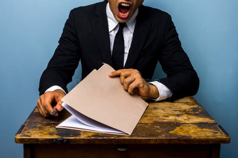 Tired Businessman Looking Over Documents Stock Image - Image of ...