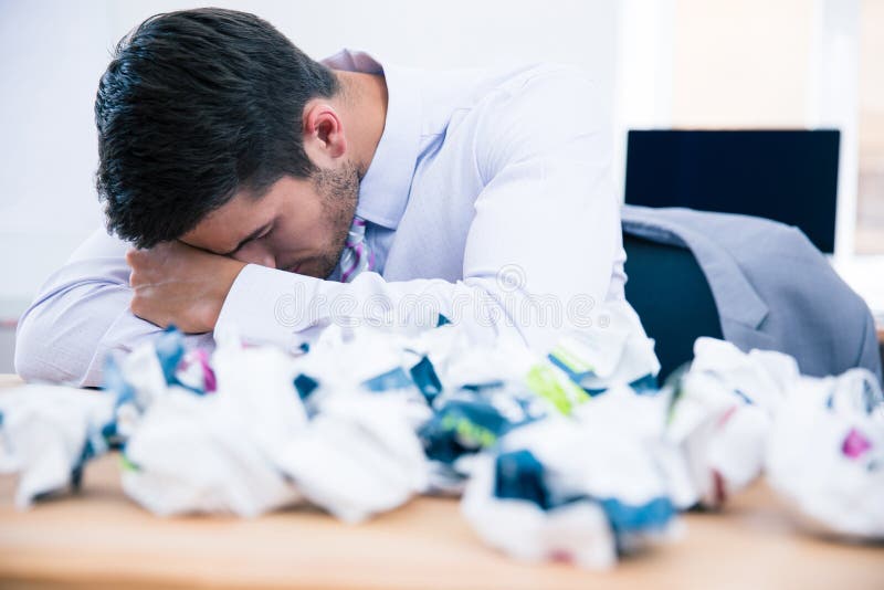 Tired Businessman Sitting at the Table in Office Stock Photo - Image of ...