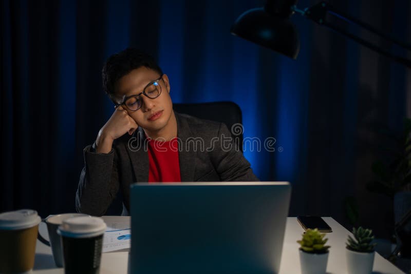 Tired Businessman Sleeping at His Desk with Computer and Coffee Cup ...