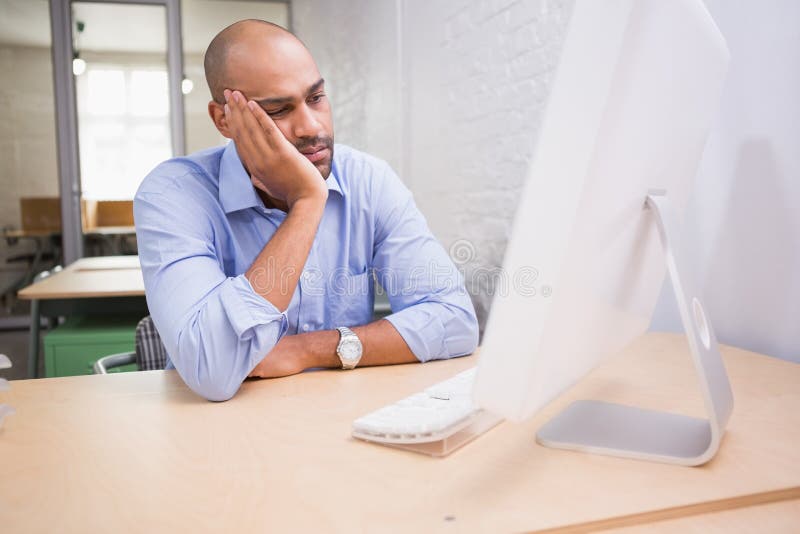 Tired Businessman Using Computer at Desk Stock Photo - Image of ...