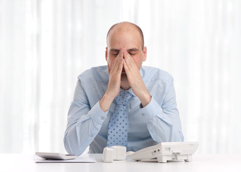 Tired businessman at work stock image. Image of expression - 25887485