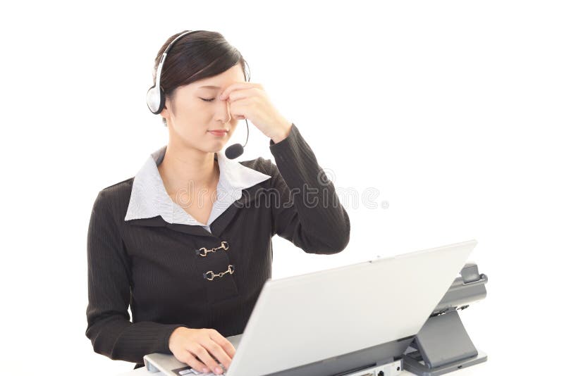 Tired call center operator stock photo. Image of emotional - 91765308