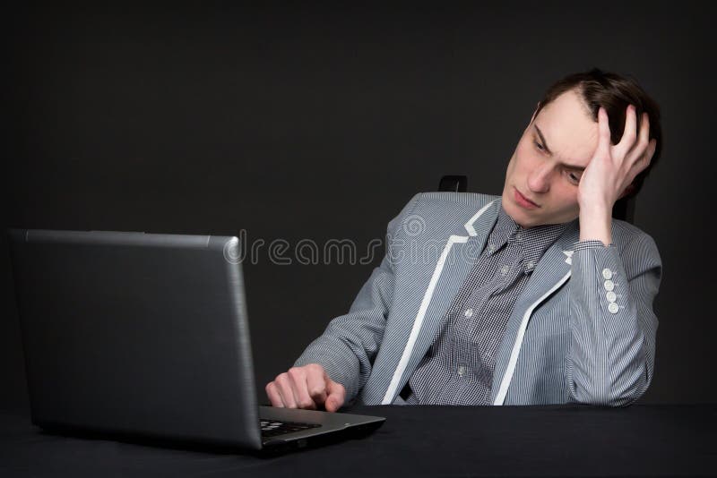 Tired Caucasian Guy Sitting in Front of Computer Stock Photo - Image of ...