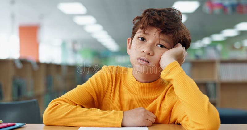Tired, Child and Face at School in Library for Development Problem ...
