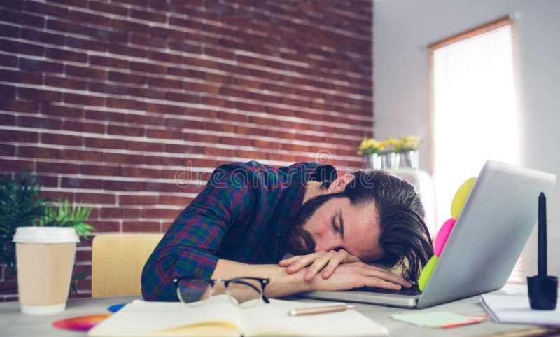 Tired man on his laptop stock image. Image of casual - 21983745