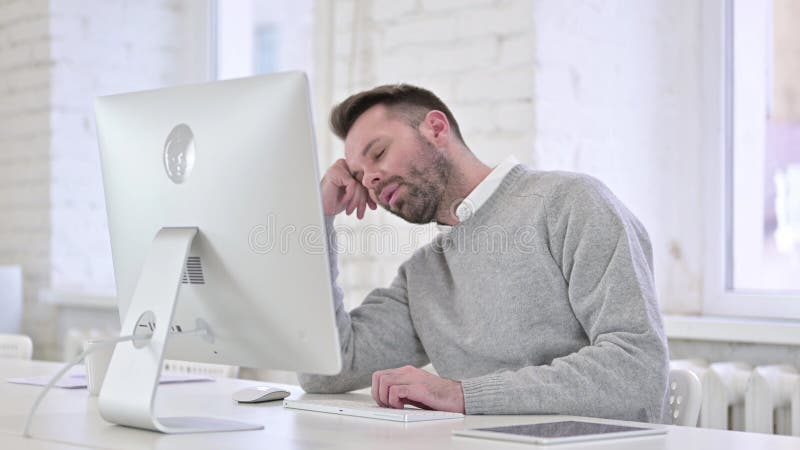 Tired Creative Man Sleeping while Working on Computer Stock Photo ...