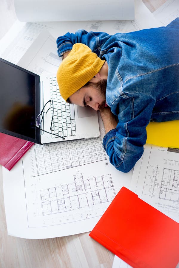 Tired designer sleeping stock photo. Image of project - 97497100
