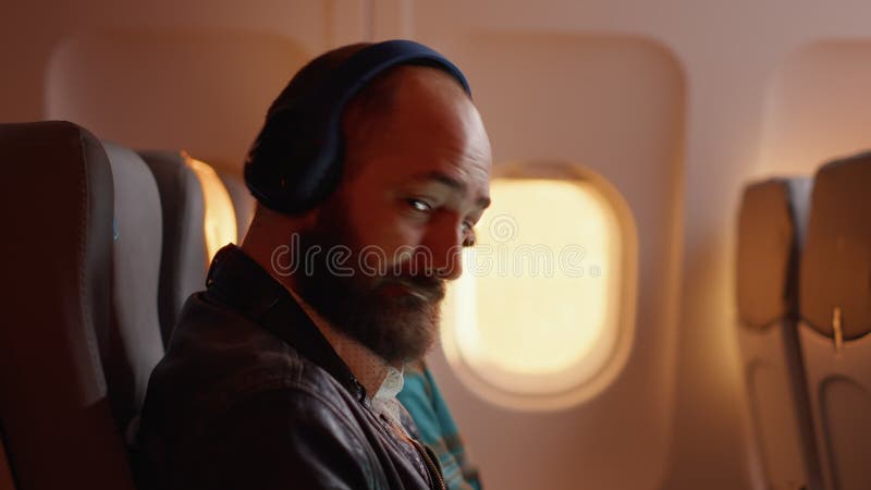 Tired Employee Travelling by Airplane and Working on Laptop Stock ...