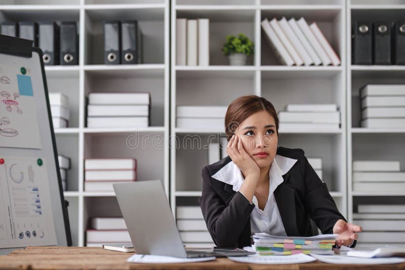 Tired Exhausted Asian Brunette Girl Tired Of Working In A Laptop