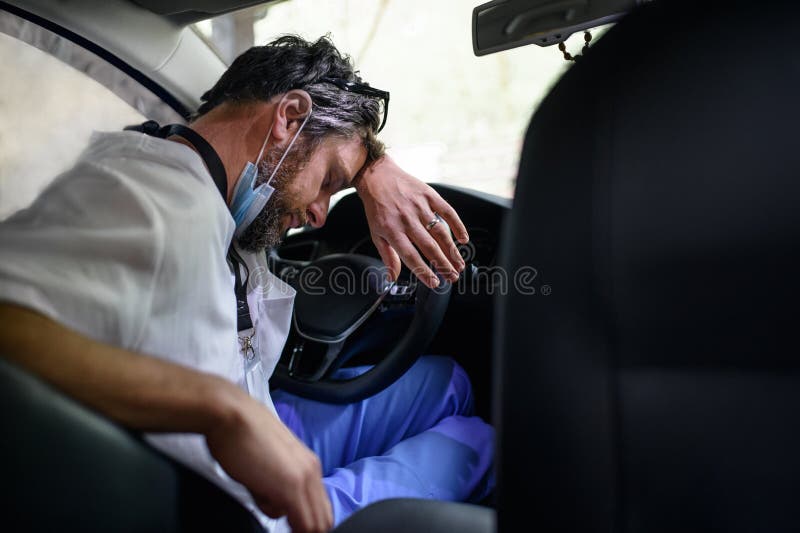 Tired and Exhausted Doctor Sitting in Car after Long and Difficult ...