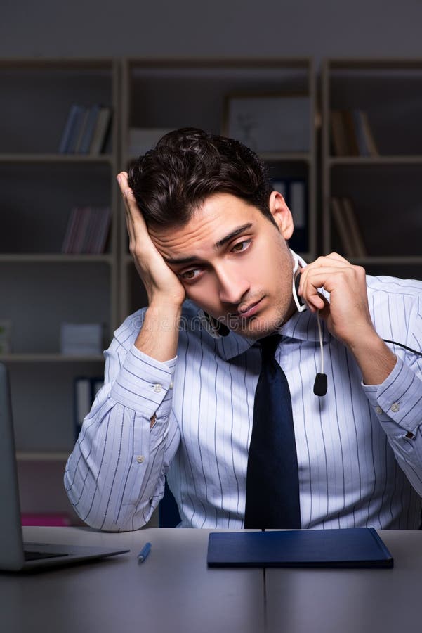 The Tired and Exhausted Helpdesk Operator during Night Shift Stock ...