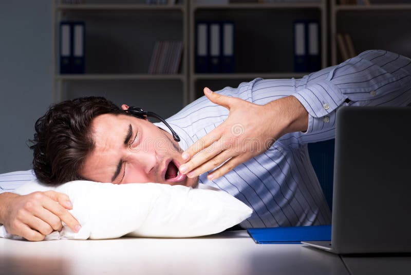 The Tired and Exhausted Helpdesk Operator during Night Shift Stock ...