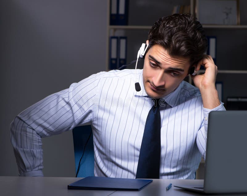 Tired and Exhausted Helpdesk Operator during Night Shift Stock Photo ...