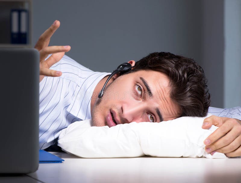 Tired and Exhausted Helpdesk Operator during Night Shift Stock Photo ...